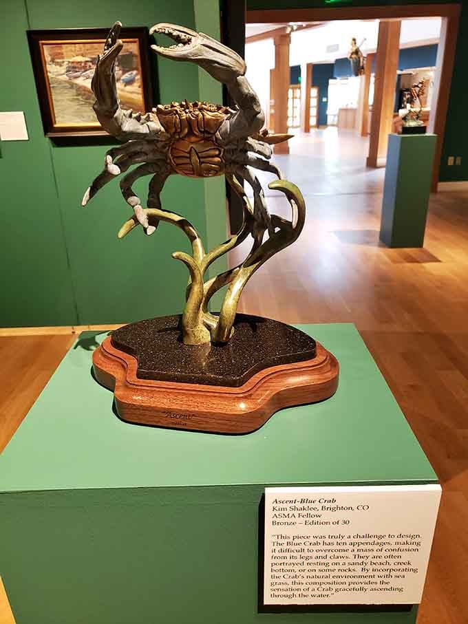 A bronze crab climbing skyward with absolute confidence. Honestly, same energy we should all bring to a Monday morning.