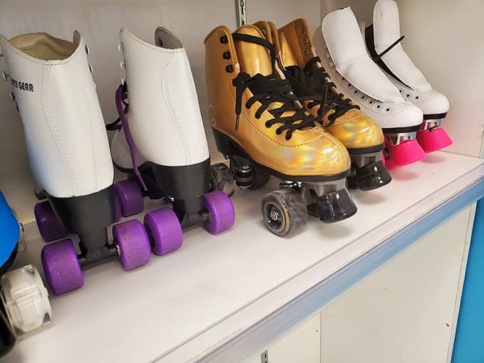 White, gold, and pink roller skates lined up neatly, calling out to anyone who still remembers the disco era fondly.