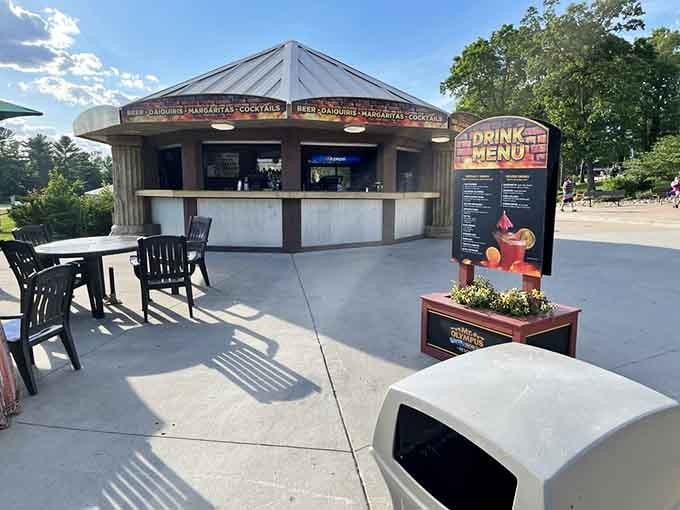 Cold drinks, warm sun, and a circular bar that understands exactly what a long day of thrills requires.