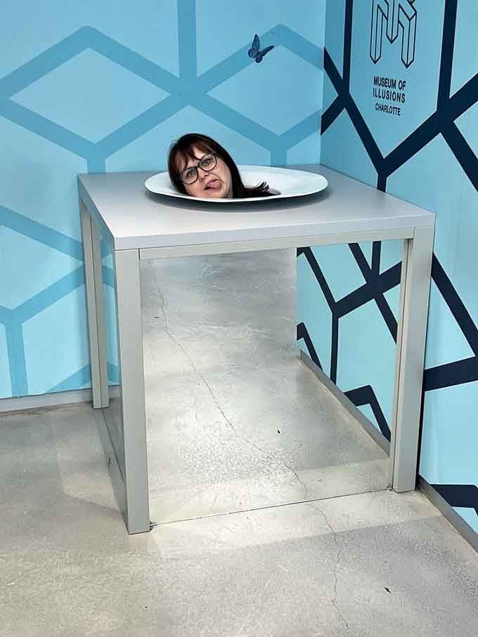 Head on a platter, and she's still making faces about it. This exhibit has a very specific sense of humor.