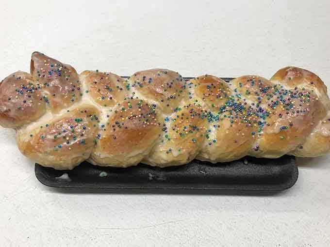 Braided, glazed, and dressed in colorful sprinkles, this festive loaf looks like a celebration you didn't know you needed.