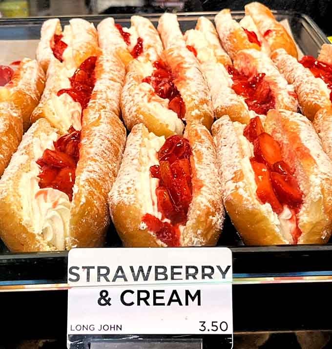 Strawberry and cream tucked into a Long John donut. This is what happiness looks like when it has a label.