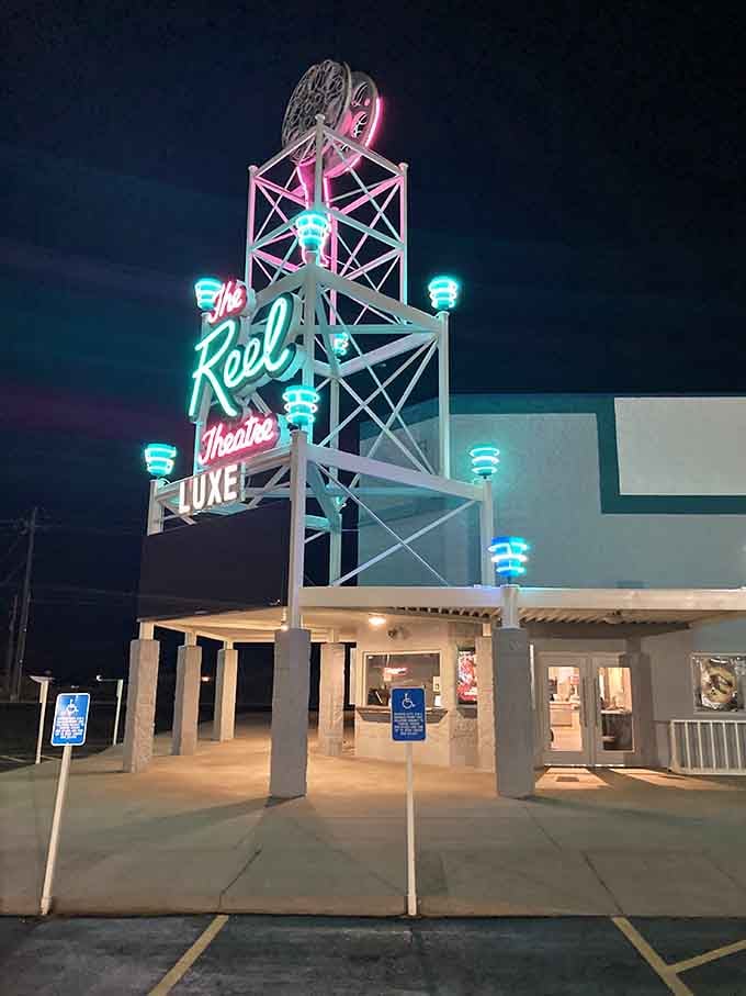 The Reel Theatre Luxe lights up the night sky like a neon postcard from a happier, simpler era.