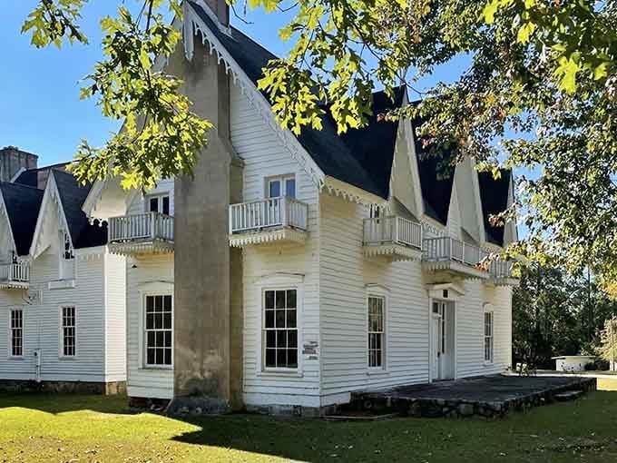 Autumn light hits those white clapboards just right, and suddenly you understand why people drive hours to see this.