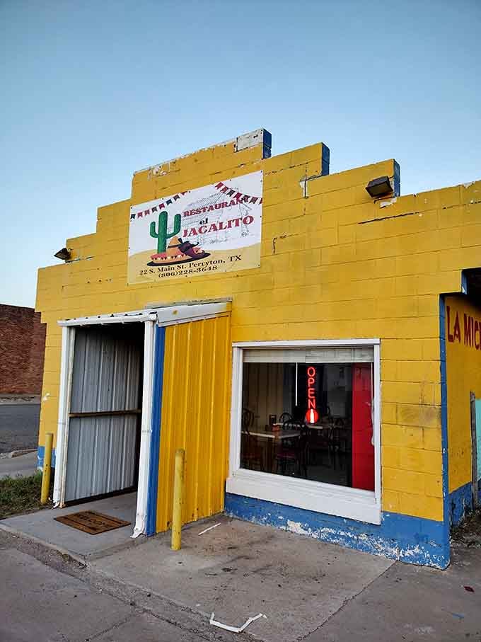 That bright yellow exterior on El Jacalito is basically a neon sign from the universe saying good food lives here, and the open sign agrees.