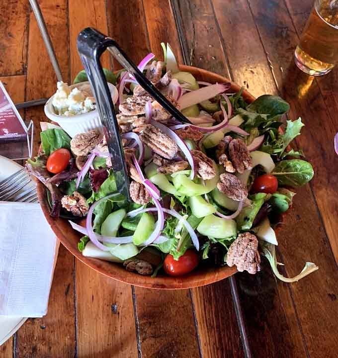 Fresh field greens, candied pecans, sliced pears, and gorgonzola. This salad is proof that vegetables can absolutely steal the show.