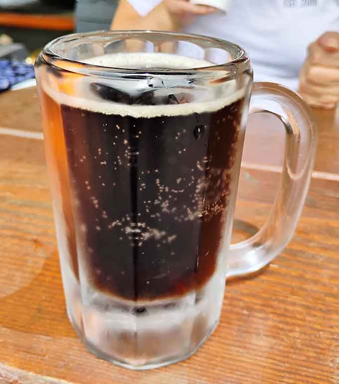 House-made root beer served cold in a frosty mug. Simple, honest, and absolutely worth the drive.