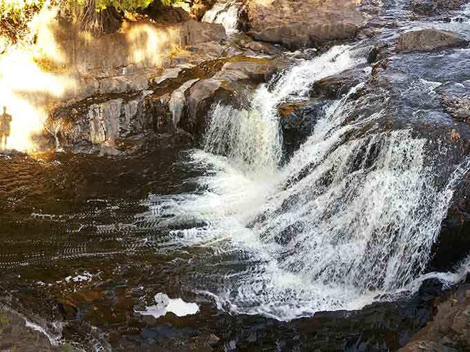 Late afternoon light hits the falls just right, turning ordinary water into something that looks genuinely magical.