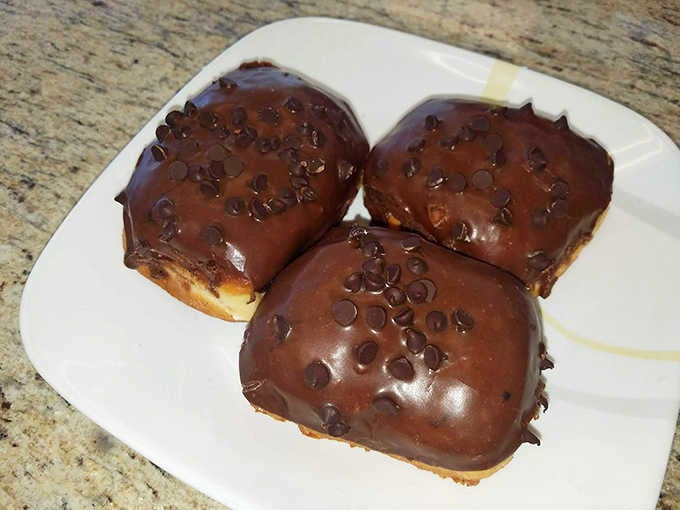 Three chocolate-glazed beauties that shine like they've been polished, ready to make your taste buds sing like the Supremes.