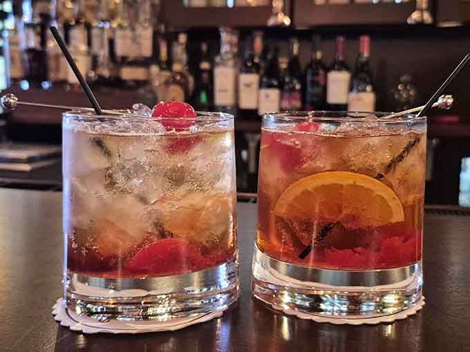 Two Wisconsin Old Fashioneds sitting at the bar, looking like they've been waiting for you all evening.