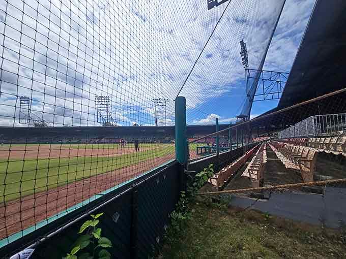 Bleacher seats that remember when baseball was the only entertainment you needed on a summer afternoon, no smartphone required.