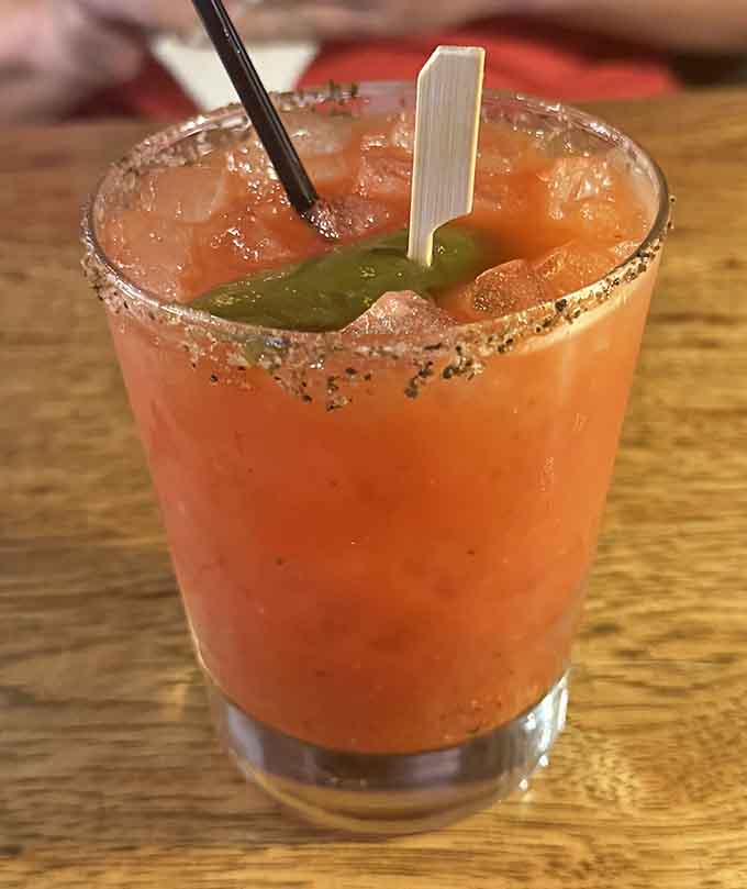 A Bloody Mary with a salted rim and a pickle garnish. Weekend mornings just found their reason to exist.