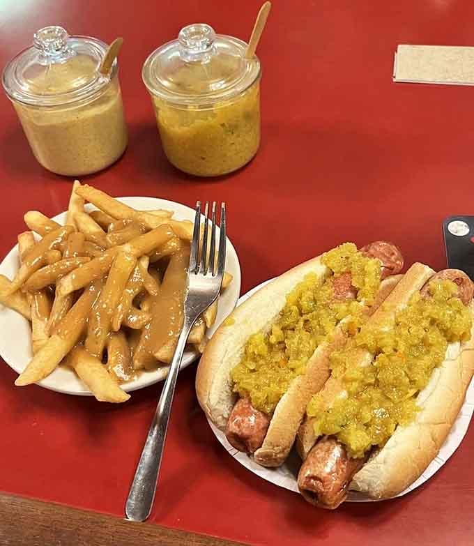 A Ripper with mustard relish next to gravy fries. This is what a good Tuesday looks like.