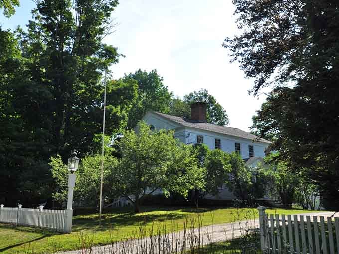 White clapboard, picket fences, and tall trees: the John C. Coffing House wears its history gracefully.