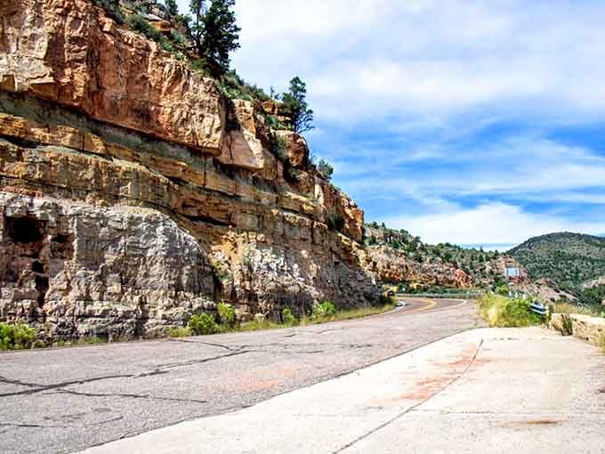 Striped canyon walls tell stories older than civilization, each layer a chapter in Earth's autobiography written in stone.