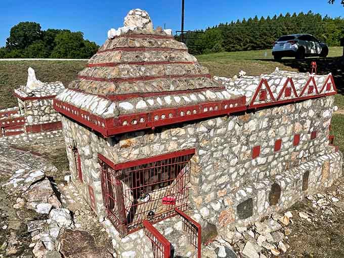 Iron bars on a miniature stone building. Even Shangri-La apparently needed somewhere to put the troublemakers.