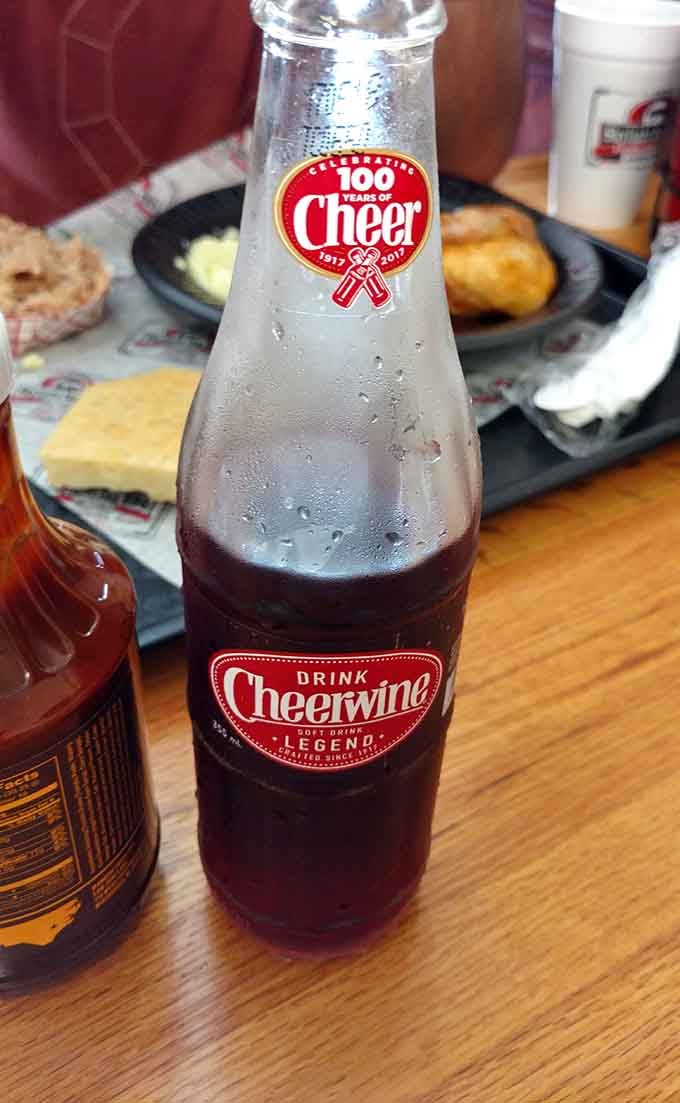 A cold bottle of Cheerwine alongside great barbecue &mdash; two North Carolina legends sharing a table feels absolutely right.