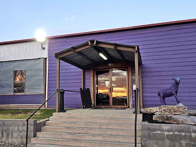 That purple exterior isn't shy, The Purple Goat announces itself with confidence and a goat statue to match.