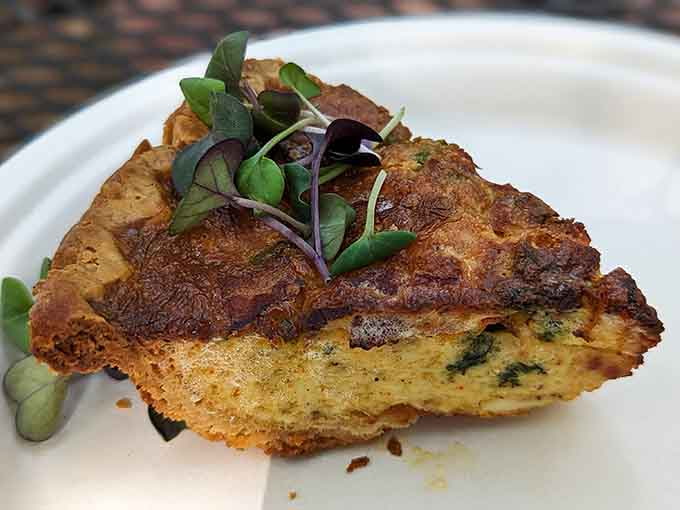 Golden, herb-flecked, and topped with fresh microgreens, this quiche is proof that simple ingredients can be quietly extraordinary.