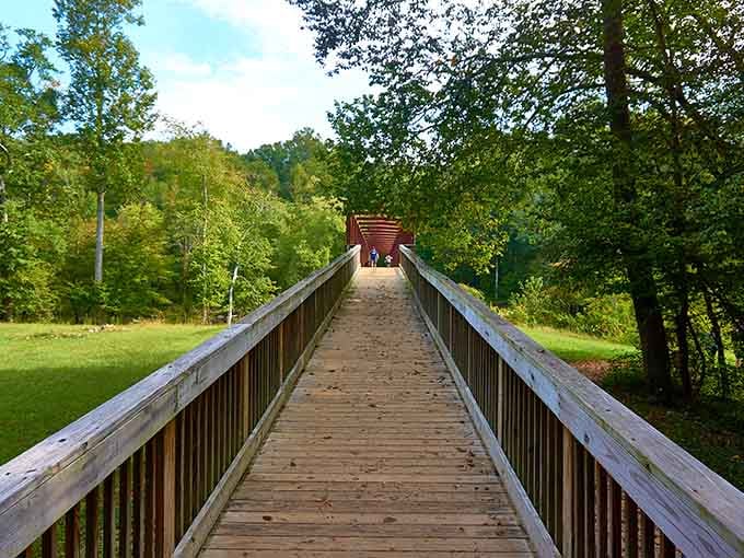 This footbridge is your gateway between the ordinary world and something genuinely extraordinary waiting on the other side.