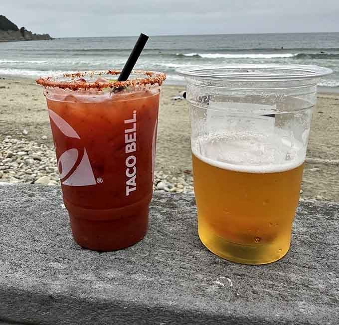 A spicy cocktail and a cold beer sitting seaside at Taco Bell. Retirement goals, honestly.
