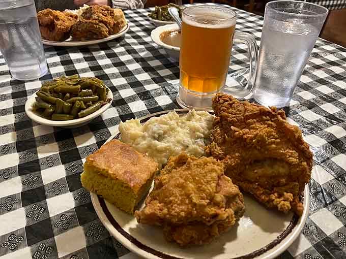 Crispy fried chicken, creamy mashed potatoes, golden cornbread, and a cold beer. Virginia just won the afternoon.