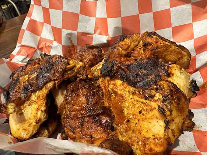 Charred, spiced, and gloriously golden. This grilled chicken means serious business on a checkered paper throne.