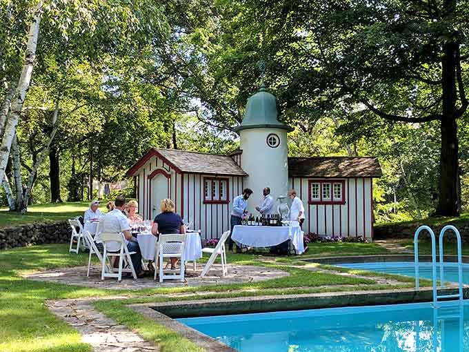 Poolside gatherings under the trees at Ten Chimneys look like a scene straight from a Gatsby novel.