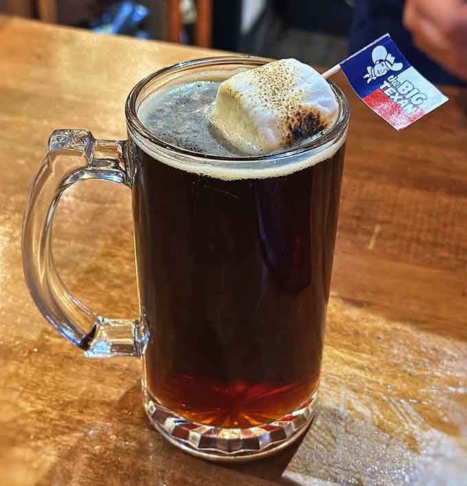 A dark craft brew topped with a toasted marshmallow and a Big Texan flag. Cheers.