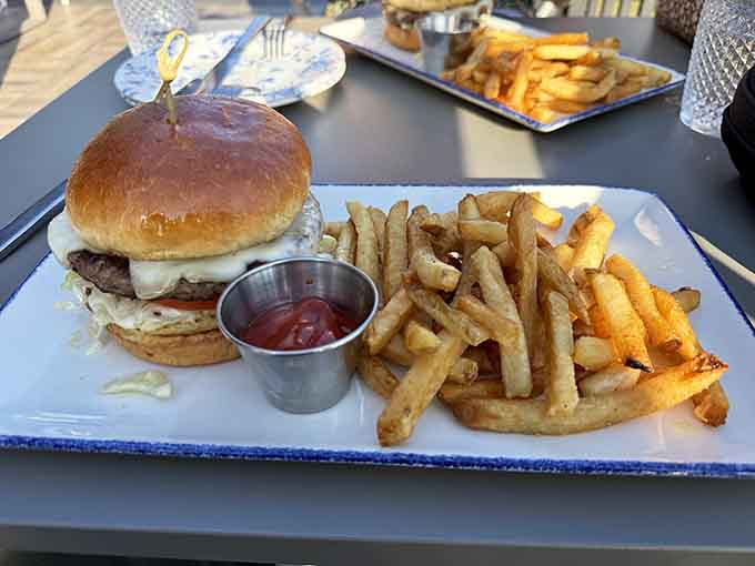 The Fox Burger arrives with a mountain of golden fries, looking like a very good decision.