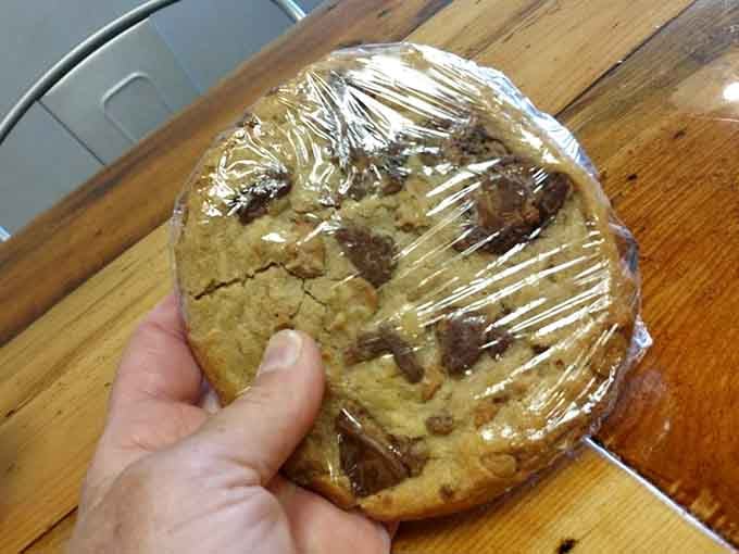 This oversized cookie wrapped in plastic promises the kind of sweet ending that makes you forget about counting calories entirely.