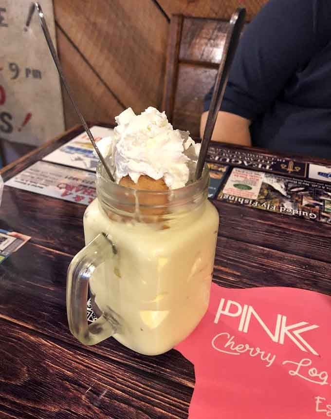 Banana pudding served in a mason jar with whipped cream on top, because some desserts deserve a proper entrance.