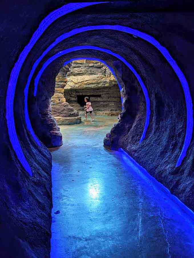 Glowing blue light, sculpted rock walls, and a tunnel that makes you feel like you're genuinely going somewhere magical.