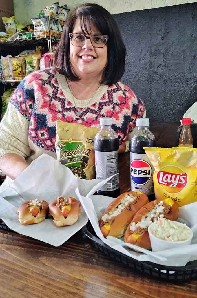 A cozy sweater, classic hot dogs with all the toppings, and your favorite snacks make for the perfect diner lunch.