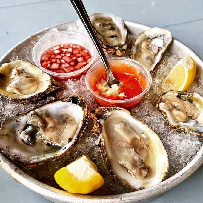 Fresh Delaware Bay oysters on ice, served with cocktail sauce and lemon. Simple, briny, and absolutely worth the slurp.
