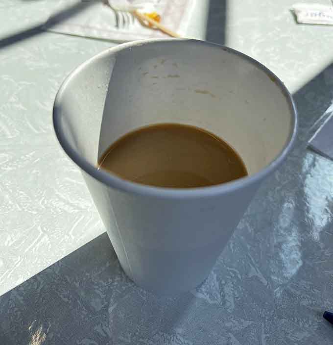 A simple cup of coffee that somehow tastes better surrounded by fresh pastries and warm brick walls. Context matters.