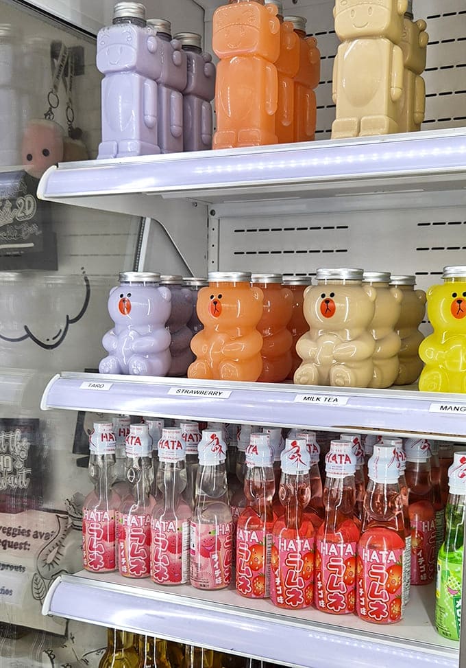 Adorable bear-shaped bottles line the shelves, making even choosing a drink feel like a whimsical adventure.