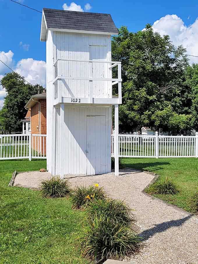 Gravel path, tidy landscaping, and a two-story outhouse. This little park has its priorities perfectly sorted.