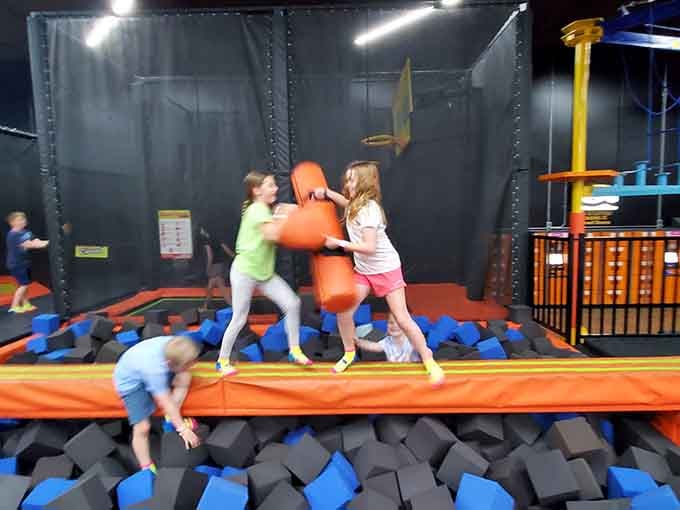 Foam pit jousting is apparently a sport now, and these two are absolutely playing for keeps.