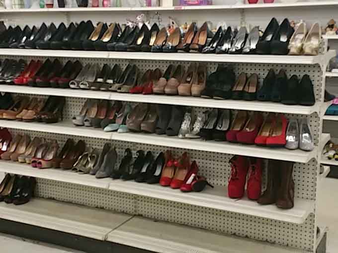 Rows of heels, flats, and dress shoes lined up like they're auditioning for a spot in your closet.