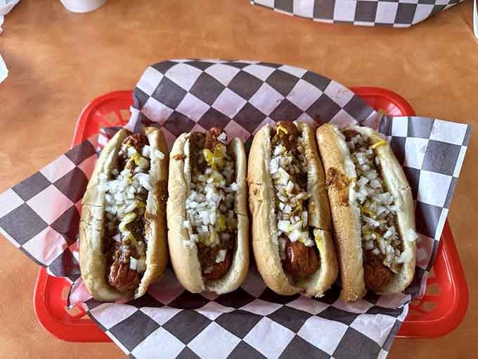 Four chili dogs lined up like a beautiful, delicious army ready to make your afternoon considerably better.