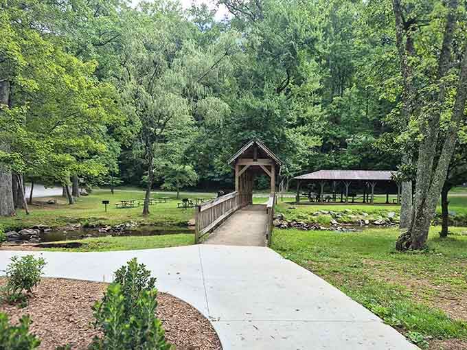 A covered bridge over a quiet creek is basically nature's version of a welcome mat.