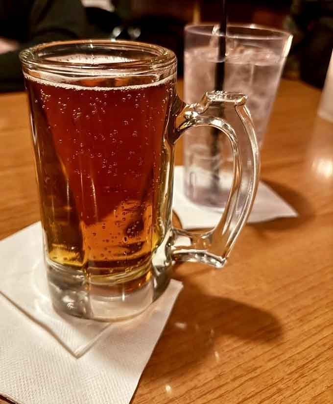 A cold beer in a classic mug at Wag's bar, simple, honest, and exactly what the moment calls for.