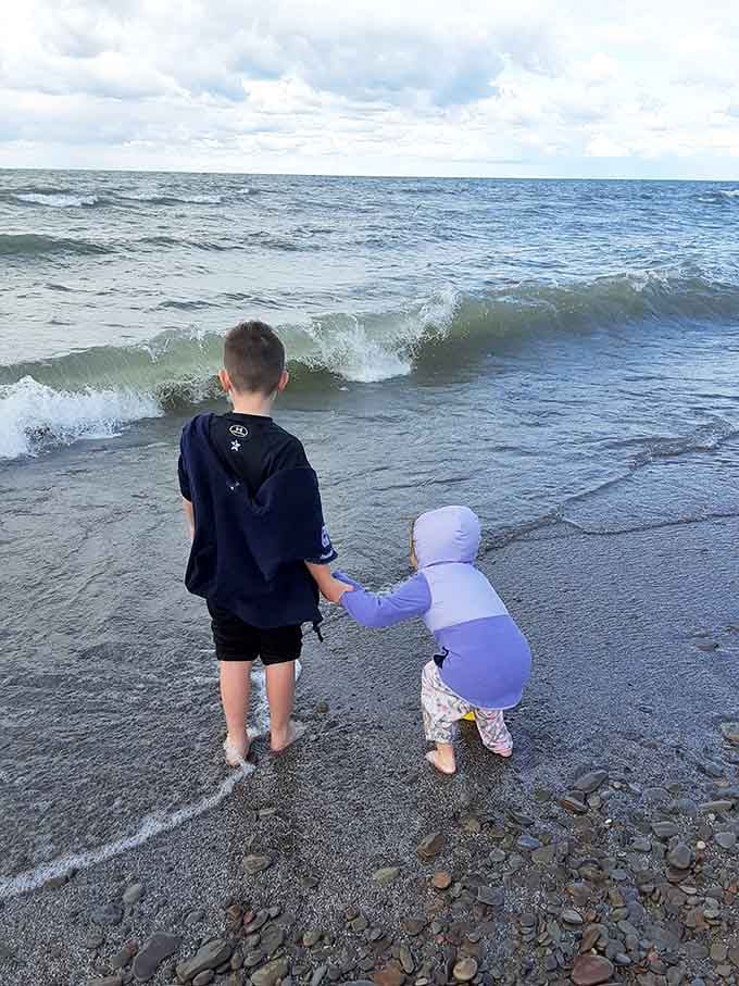 Two kids, one lake, infinite memories being made in real-time right here.