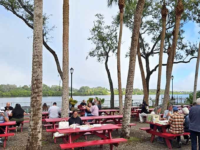 Red picnic tables, tall palms, and a waterfront breeze &mdash; lunch doesn't get more unexpectedly beautiful than this.