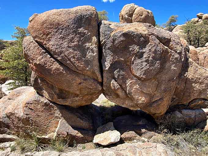 Two massive boulders leaning together like old friends sharing a secret they've kept for millions of years.