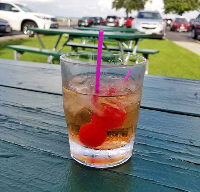 A classic Wisconsin Old Fashioned, cherries and all, enjoyed lakeside where life moves at the right pace.