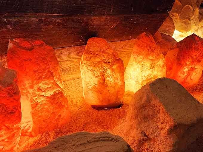 Backlit salt rocks glow like tiny suns, turning a simple shelf display into something almost meditative.