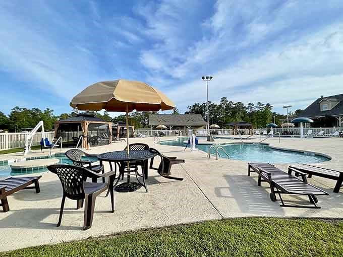 A sparkling pool, lounge chairs, and open sky above. Your only real decision here is which chair to claim first.
