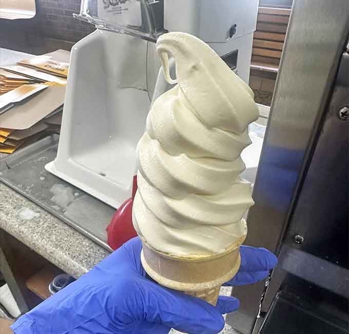 That soft serve swirl is tall enough to require its own building permit. A perfect sweet finish.